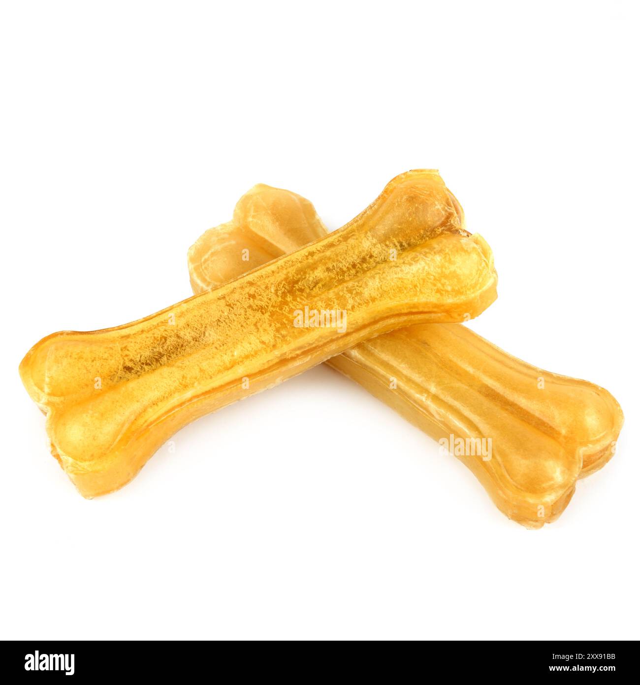 Chew bones for dog isolated on white background, top view. Pet toys ...