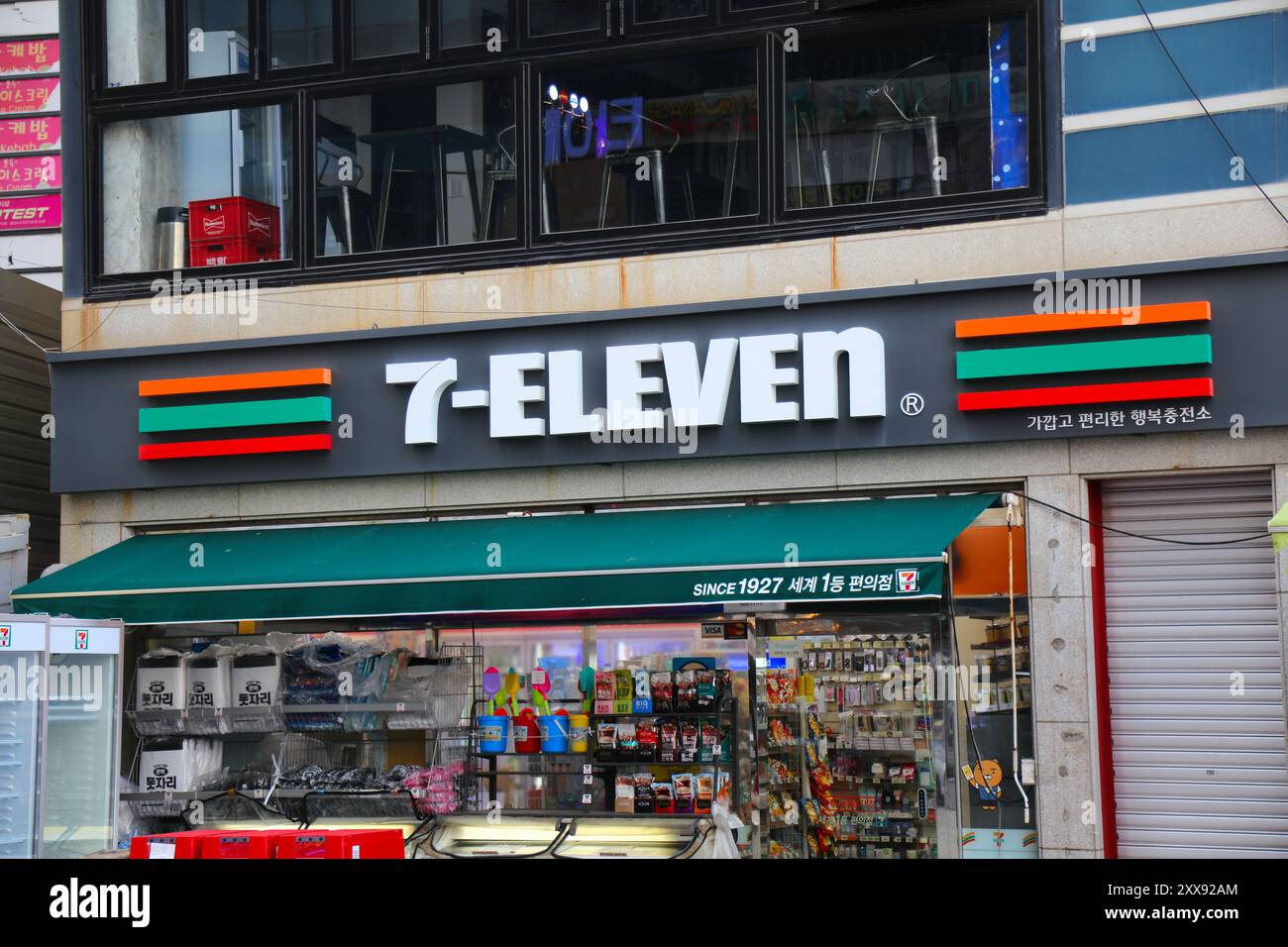 BUSAN, SOUTH KOREA - MARCH 29, 2023: 7-Eleven brand convenience store ...