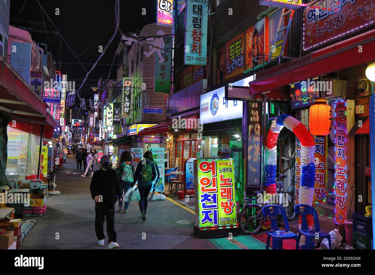 BUSAN, SOUTH KOREA - MARCH 28, 2023: People visit night streets of ...