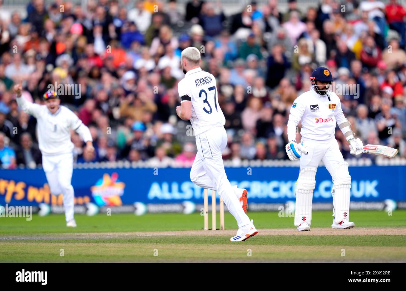 England's Gus Atkinson (centre) celebrates the wicket of Sri Lanka's ...