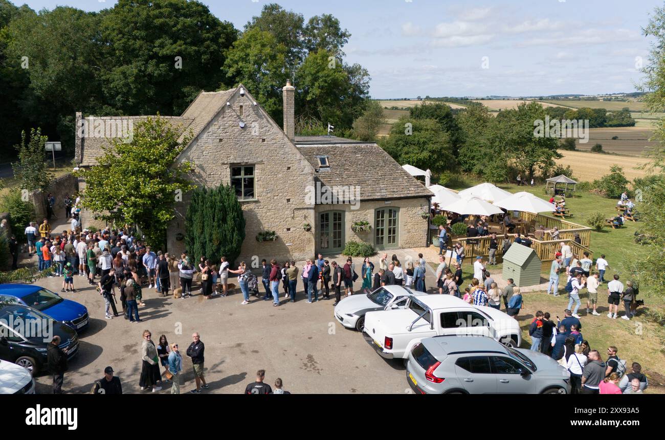 People queuing outside at the opening of Jeremy Clarkson's new pub, The ...