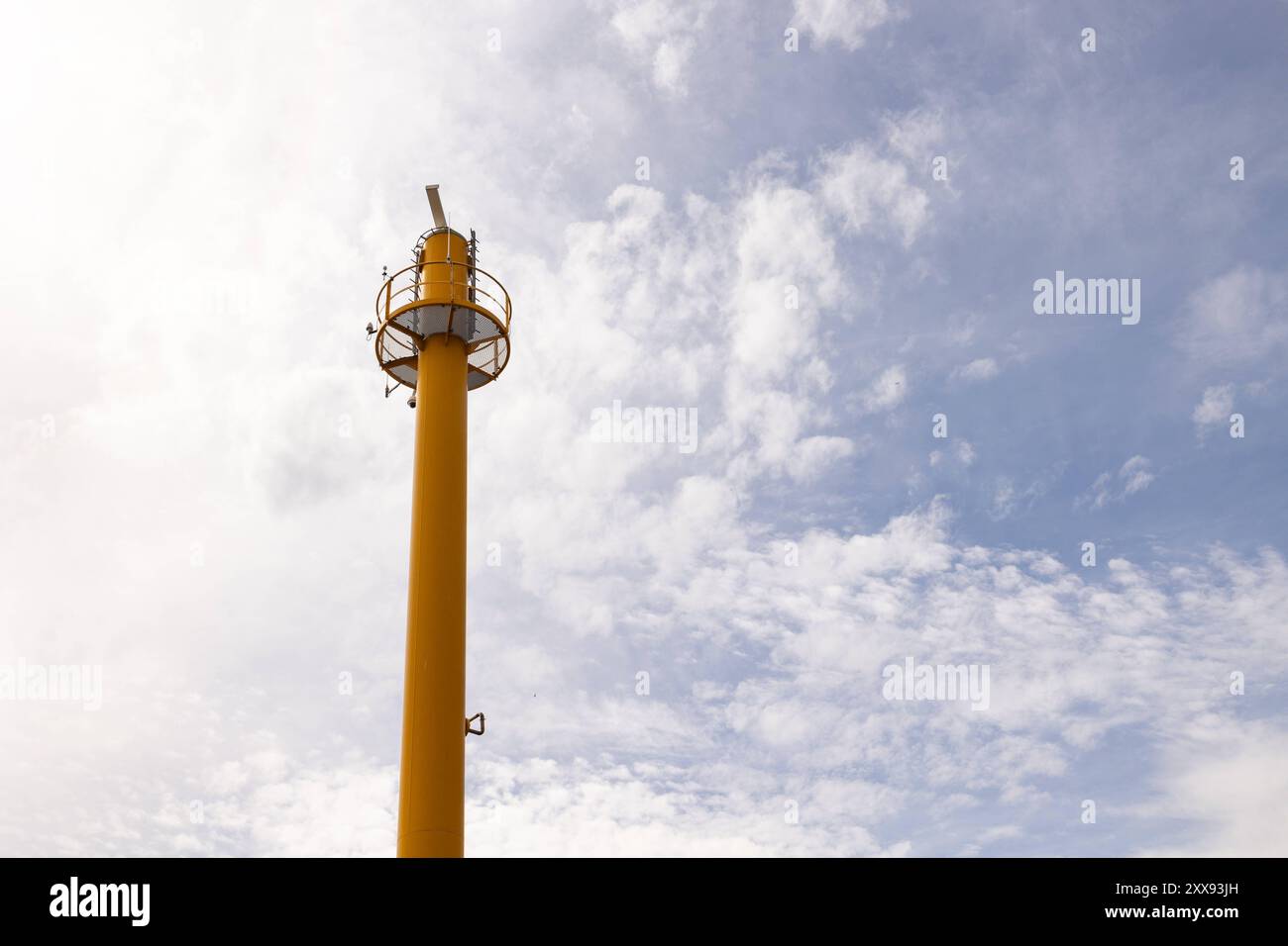 Radar antenna in the harbor for navigation at sea. Yellow radar antenna ...