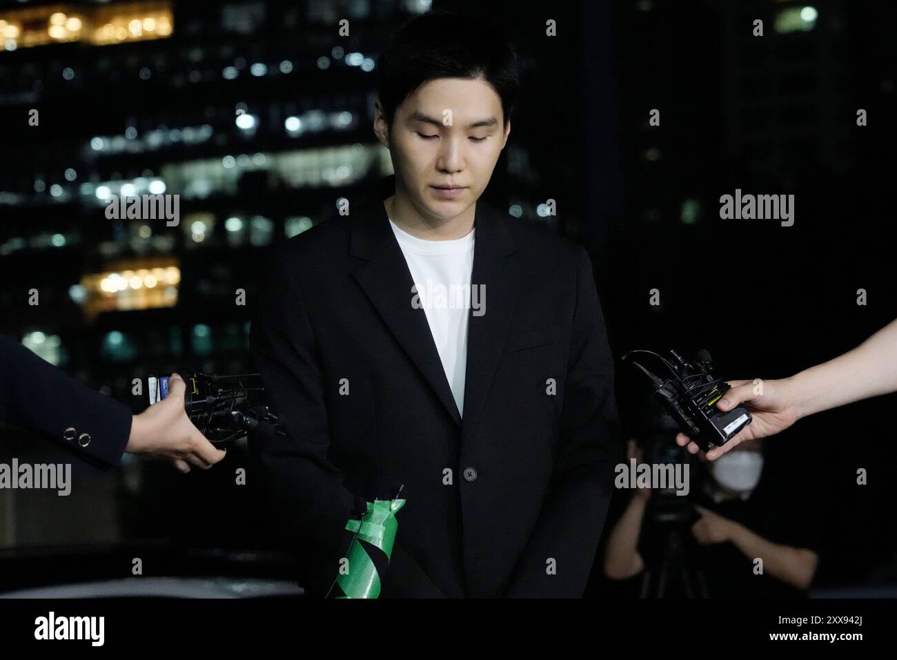 K-pop Band BTS Member Suga arrives for questioning over allegations of ...