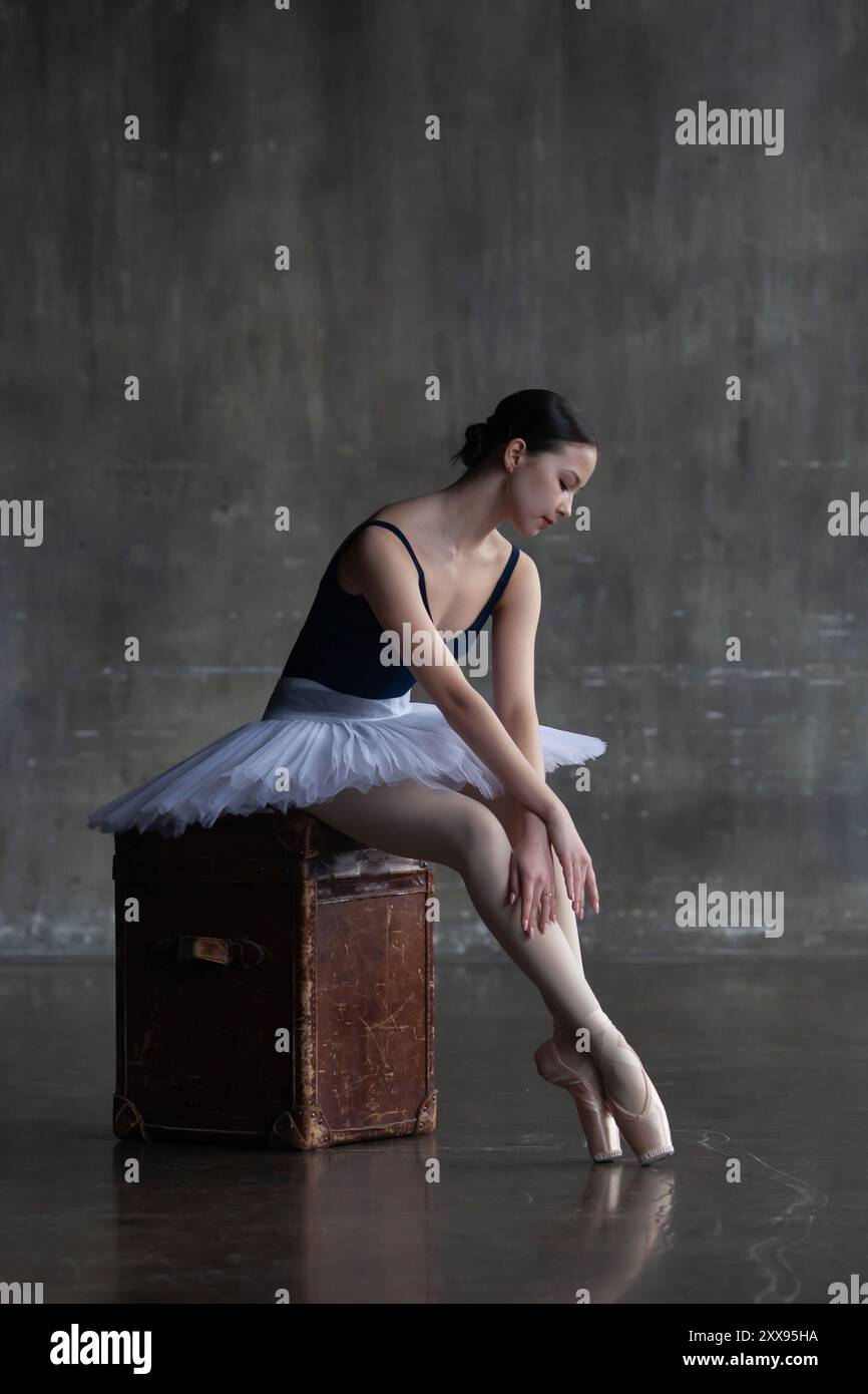 Portrait of a beautiful tired young ballerina Stock Photo - Alamy