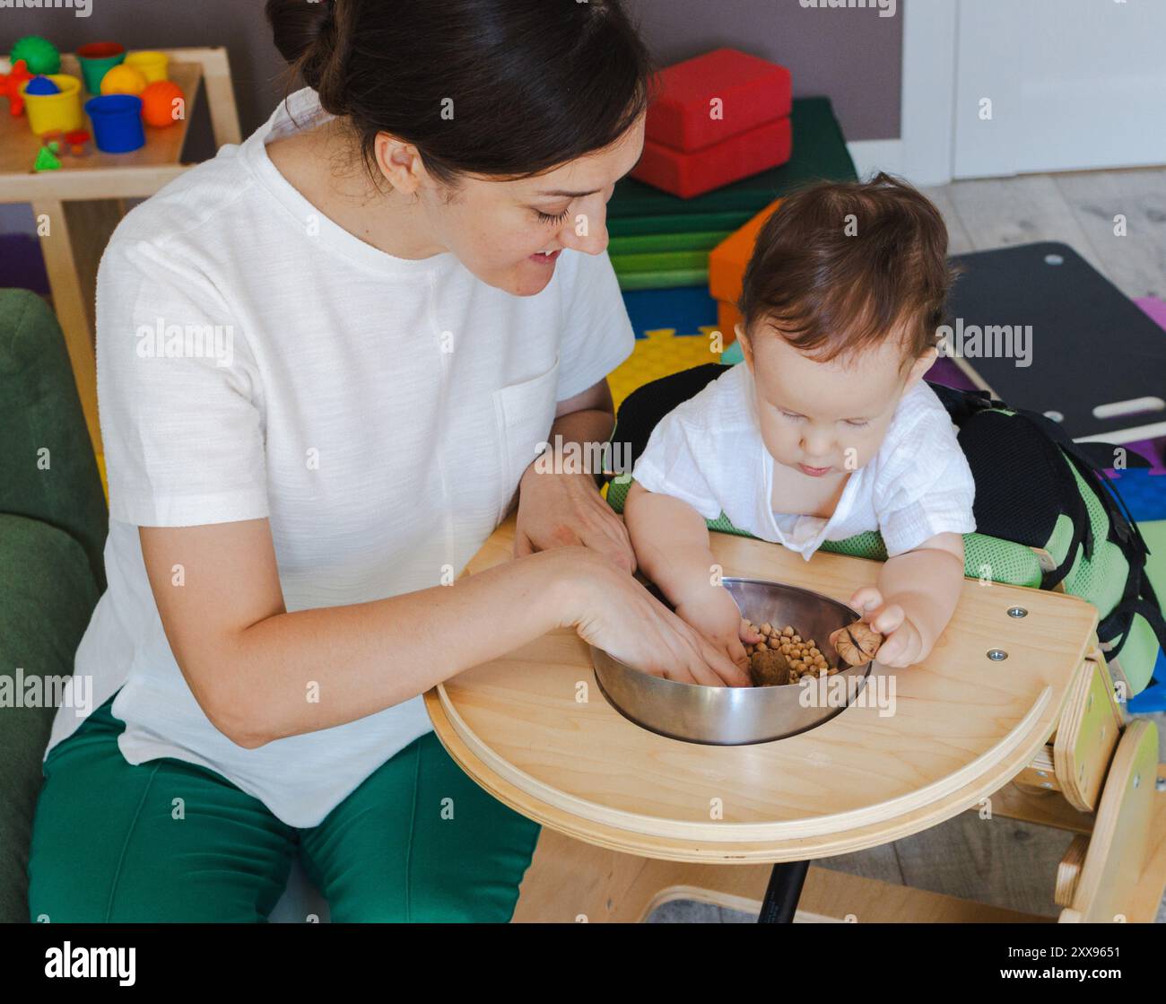 Little child with damage to CNS engaged in a physical and sensory ...