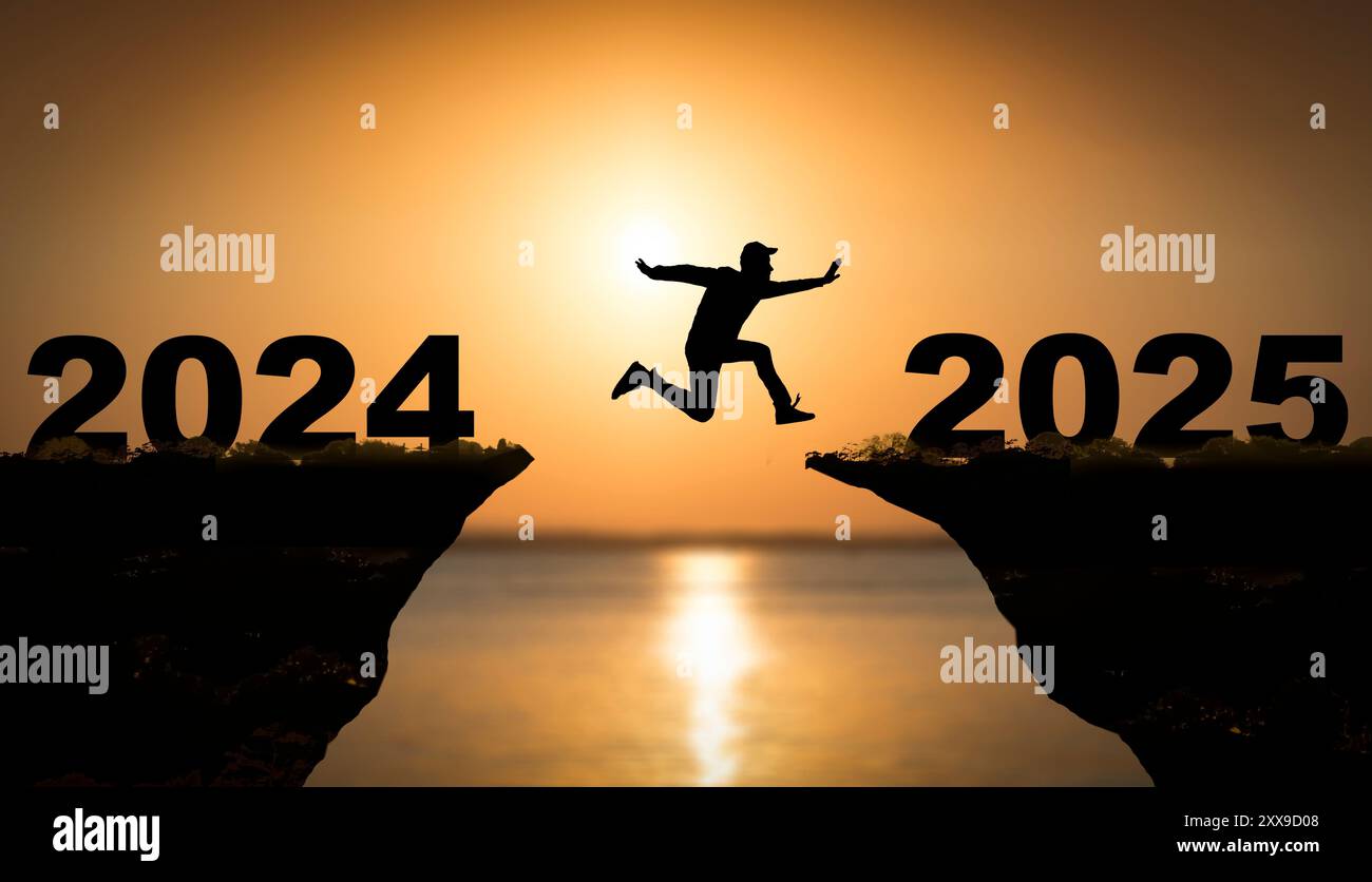 2025 year concept. Silhouettes of active people in nature against the ...