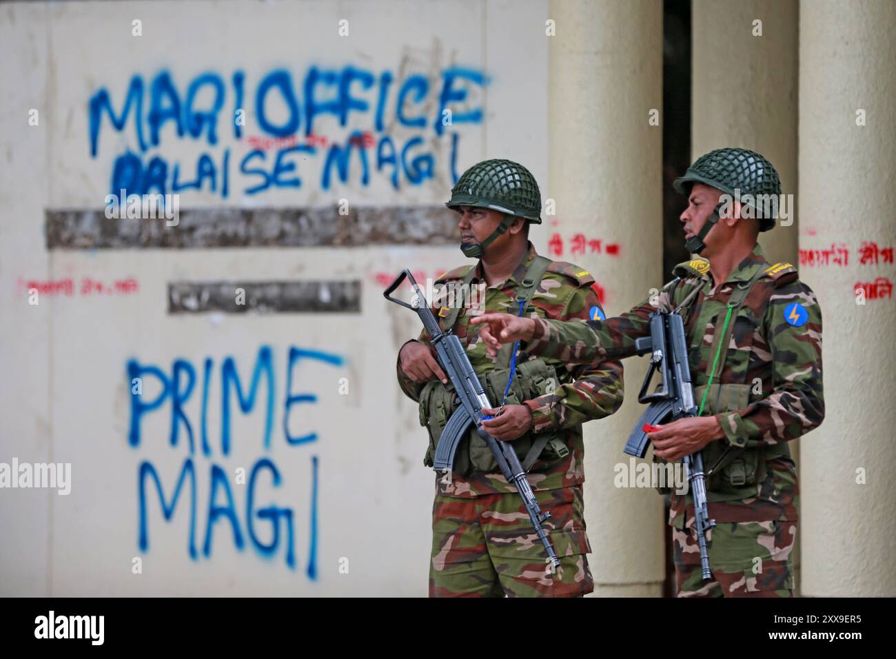 Military personnel stand guard in front of the Prime Minister Office in ...