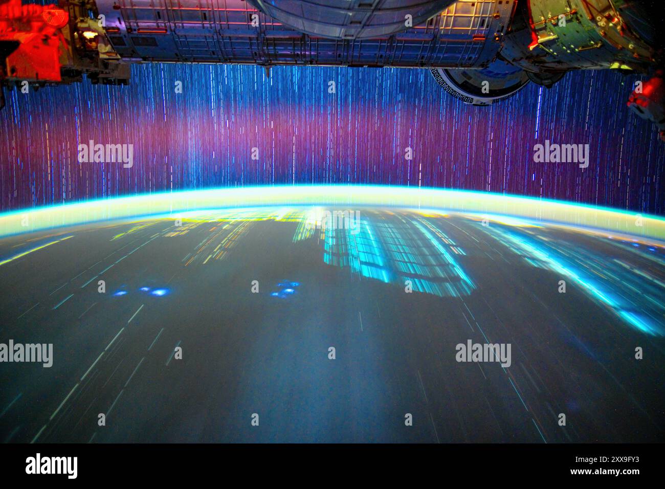 Planet Earth at night, long exposure shot with focus on the spaceship ...