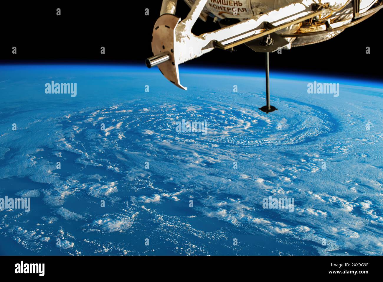 Storm forming on Planet Earth, part of the spacecraft framing the image ...