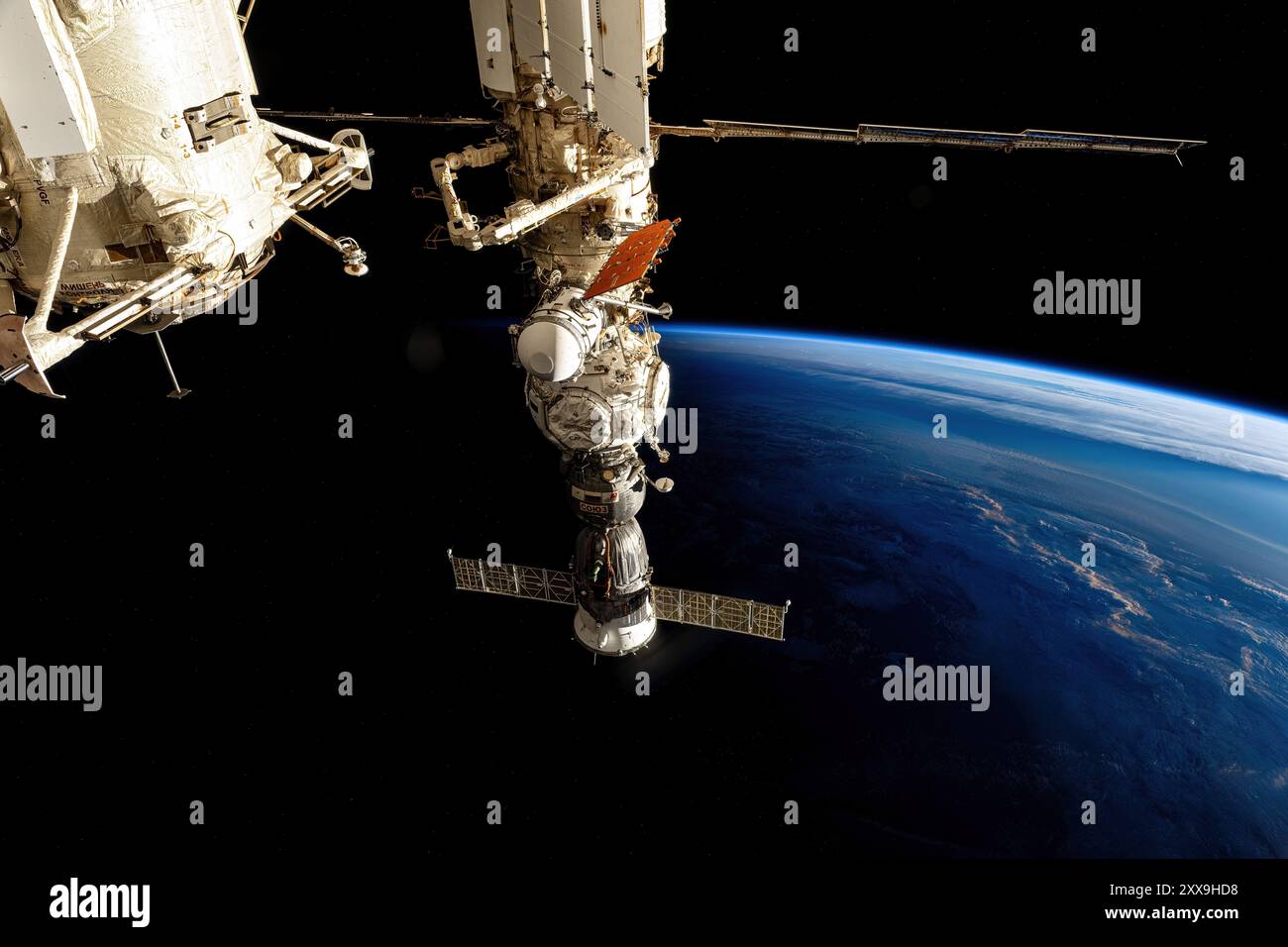 Soyuz spacecraft docked to the ISS with Planet Earth during the day ...