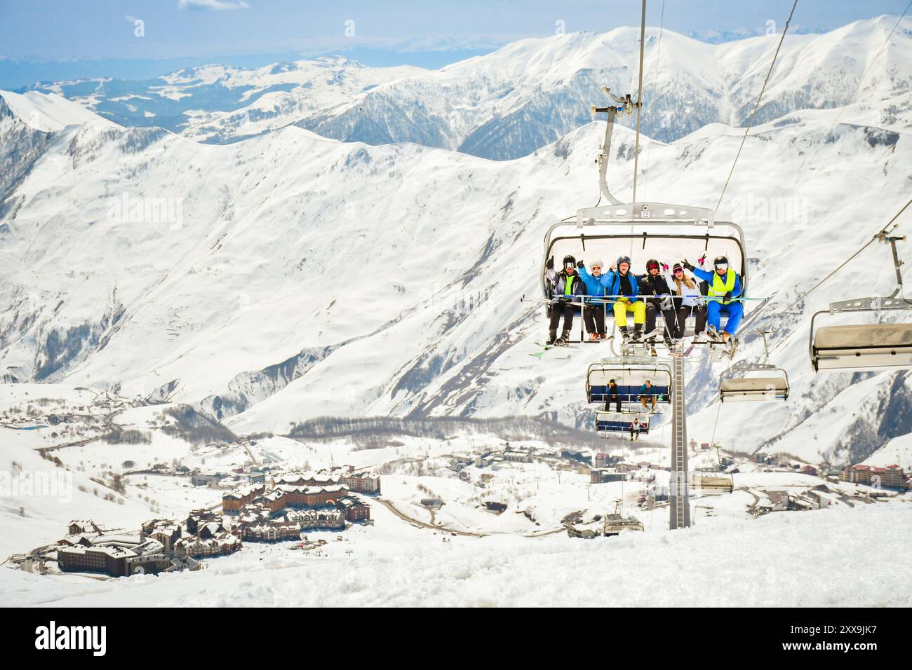 Gudauri, Georgia - 15th february, 2024: Snowboarders skiers sits on the ...