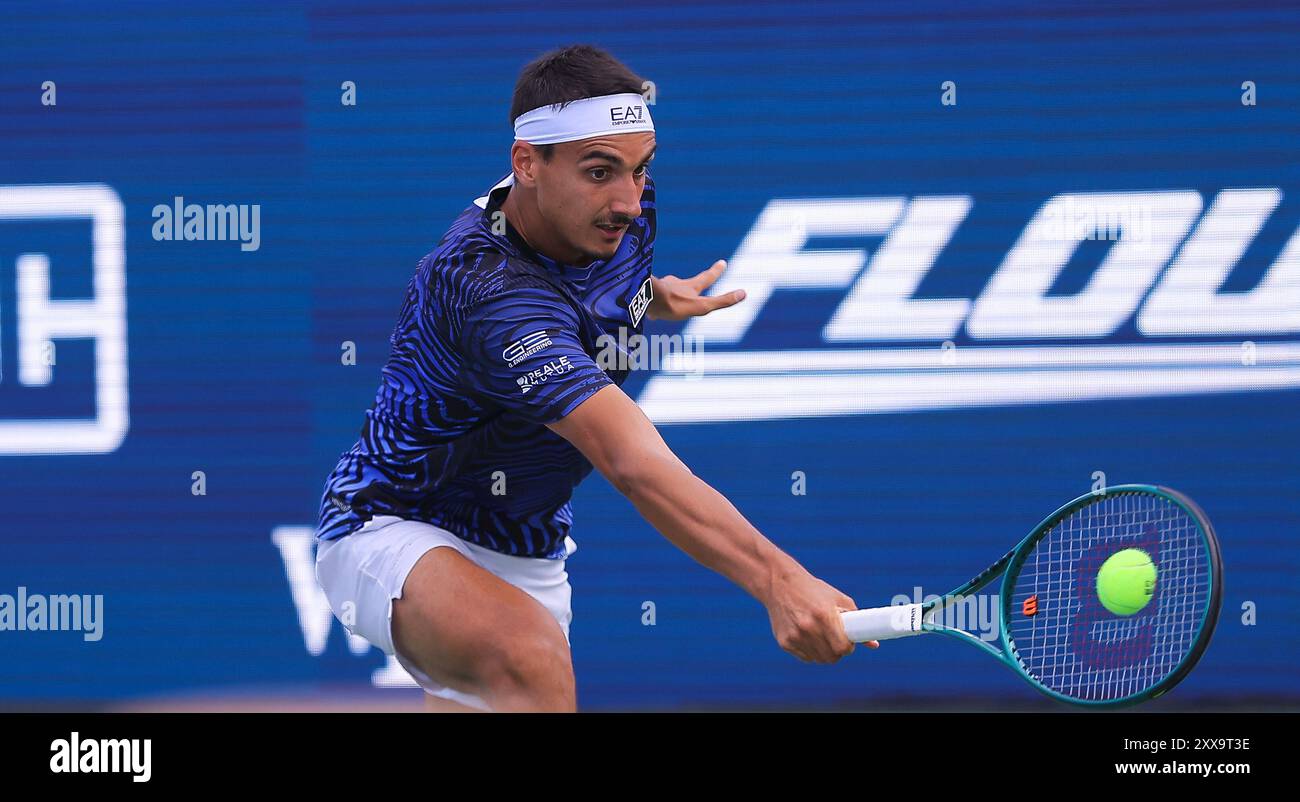 August 22, 2024: Lorenzo Sonego hits ball against Pavel Kotov. Winston ...