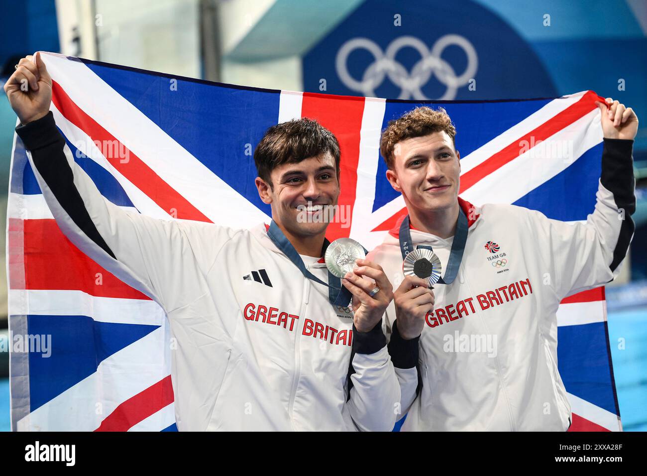 Thomas Daley and Noah Williams of Great Britain show the silver medals ...