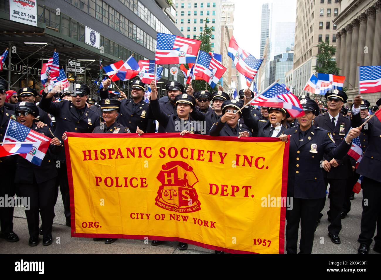 Dominican Day Parade: NYPD officers march as members of the Hispanic ...