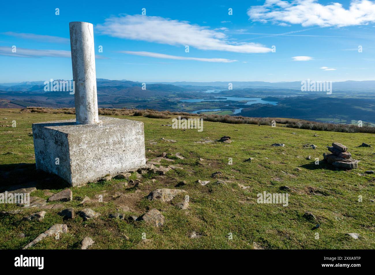 At the summit of Oketa Mountain, stone marker stand sentinel, offering ...