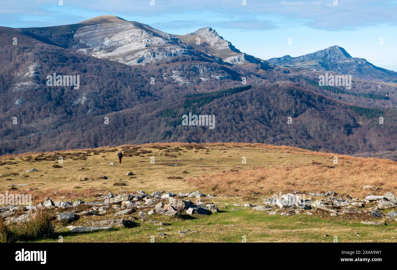 Hiker at the top of Oketa Mountain, soaking in the stunning panoramic ...