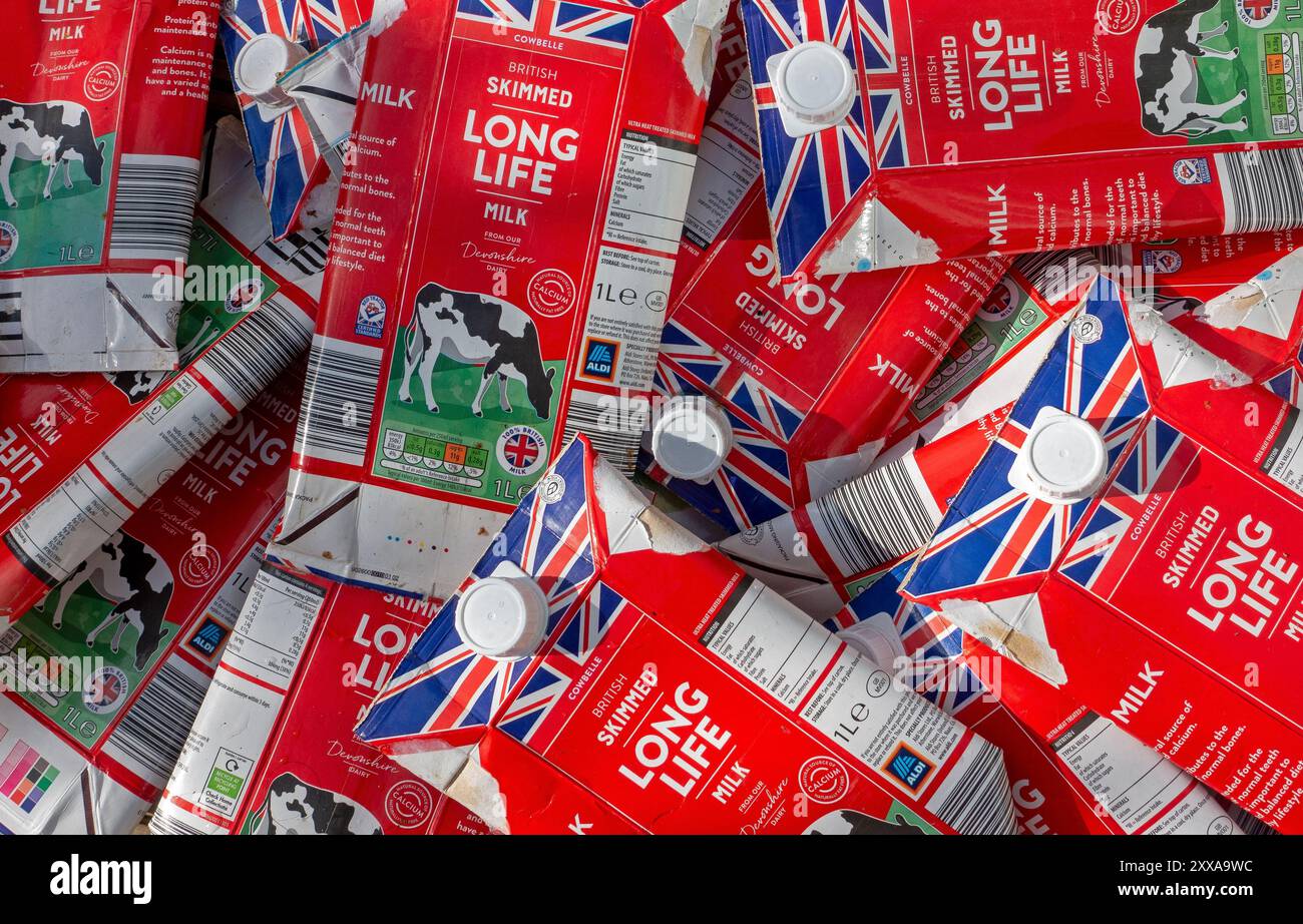 An assortment of Aldi semi skimmed long life milk cartons piled ...