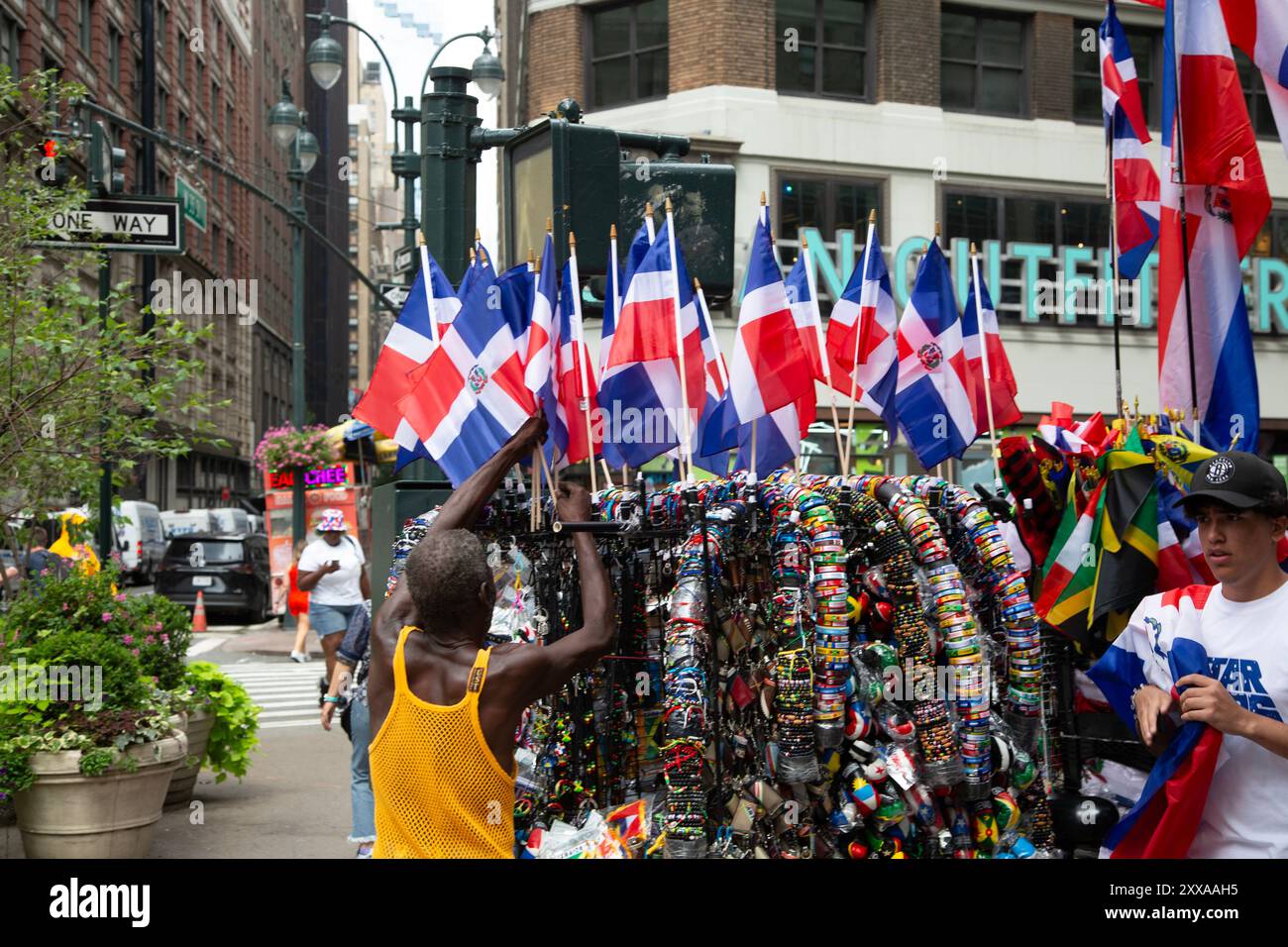 Flag vendor at the Dominican Day Parade on 6th Avenue in New York City ...