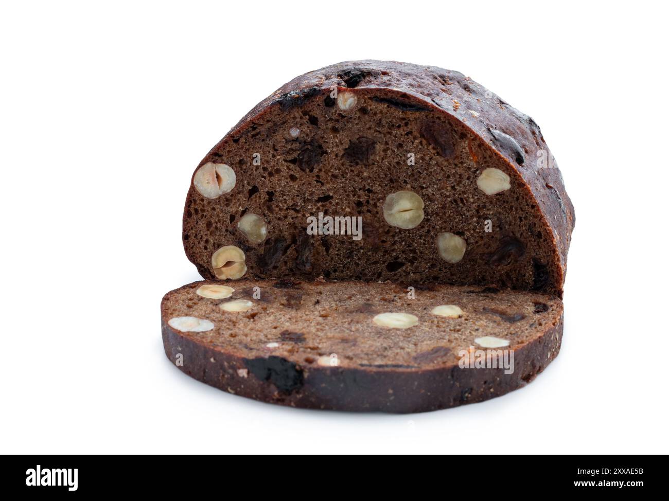 Sweet rye bread with hazelnuts and dried fruits isolated on white Stock ...