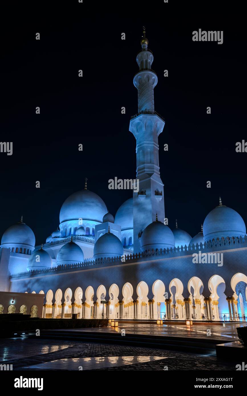 Side view of the Sheikh Zayed Mosque at night with some of the 82 white ...