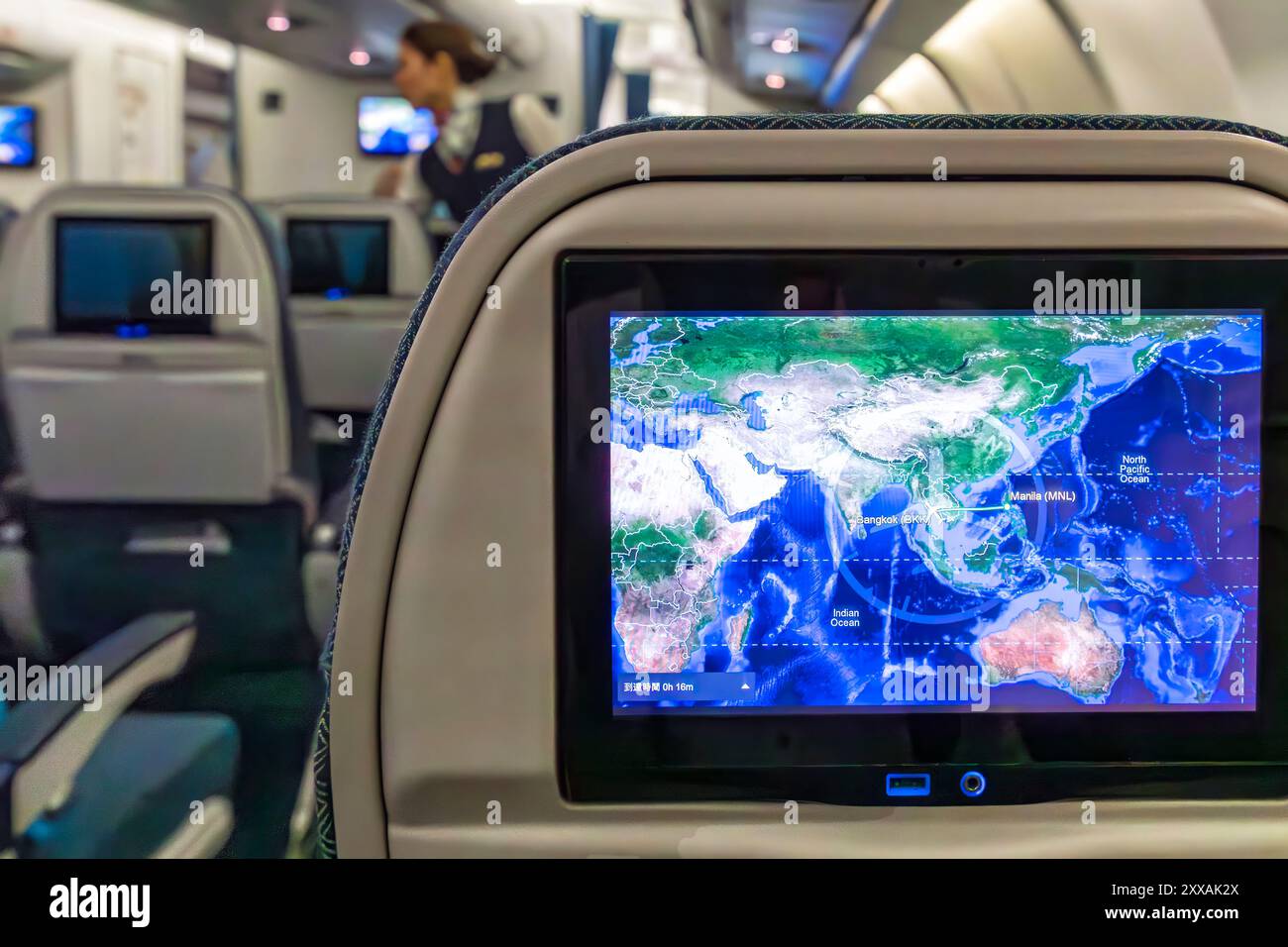 Seat back television screen showing flight path on Philippine Airlines ...