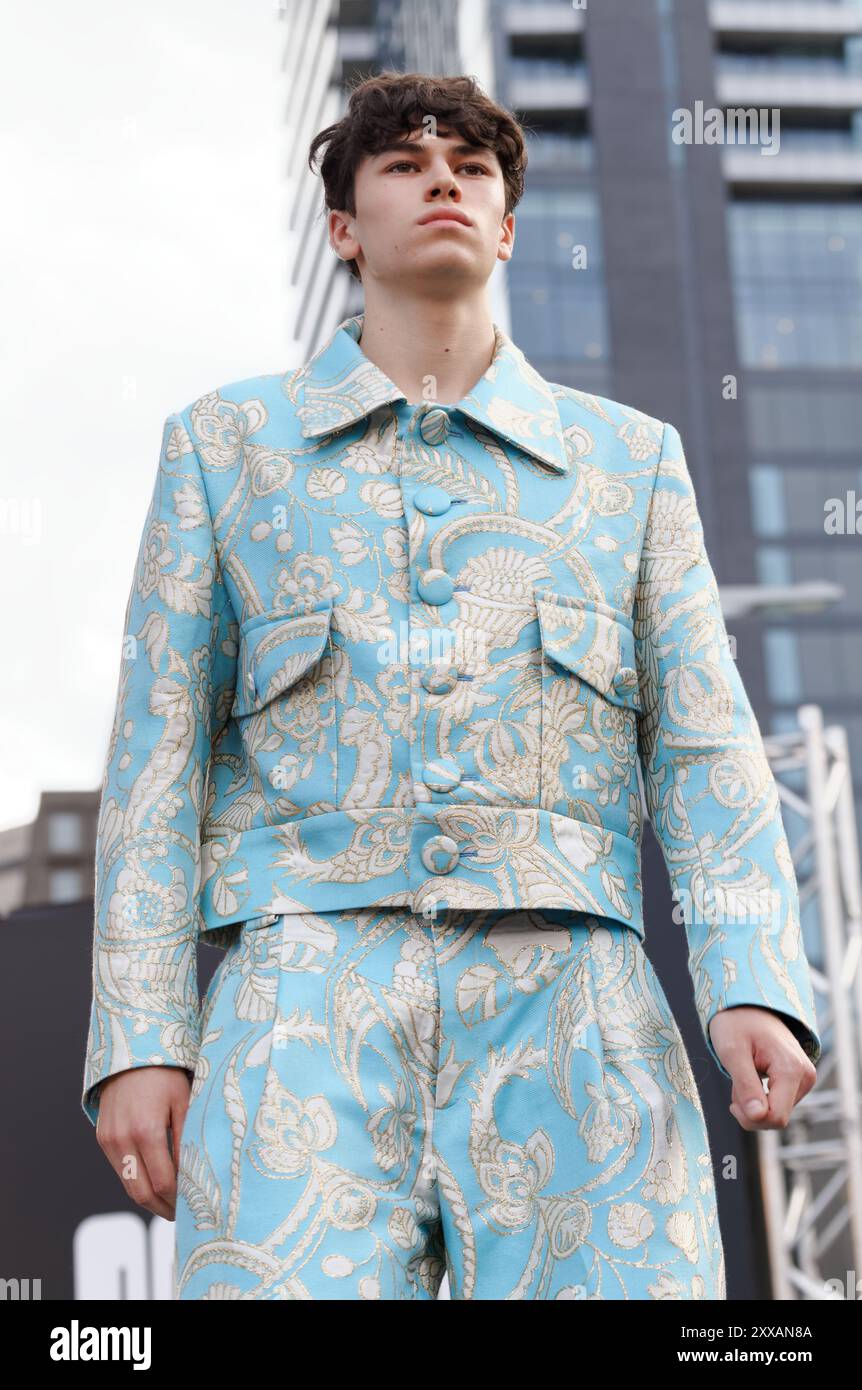 A model poses on the runaway at the Helmer fashion show in Montreal ...