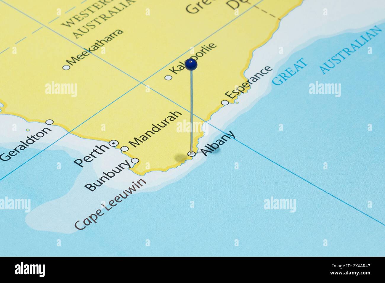 Close up to a Albany city with a blue pin needle into Australia country ...