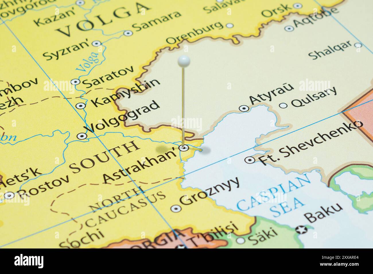 Close up to a Astrakhan city with a white pin needle into Russia ...