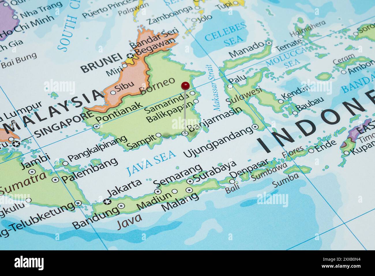 Close up to a Banjarmasin city with a red pin needle into Indonesia ...