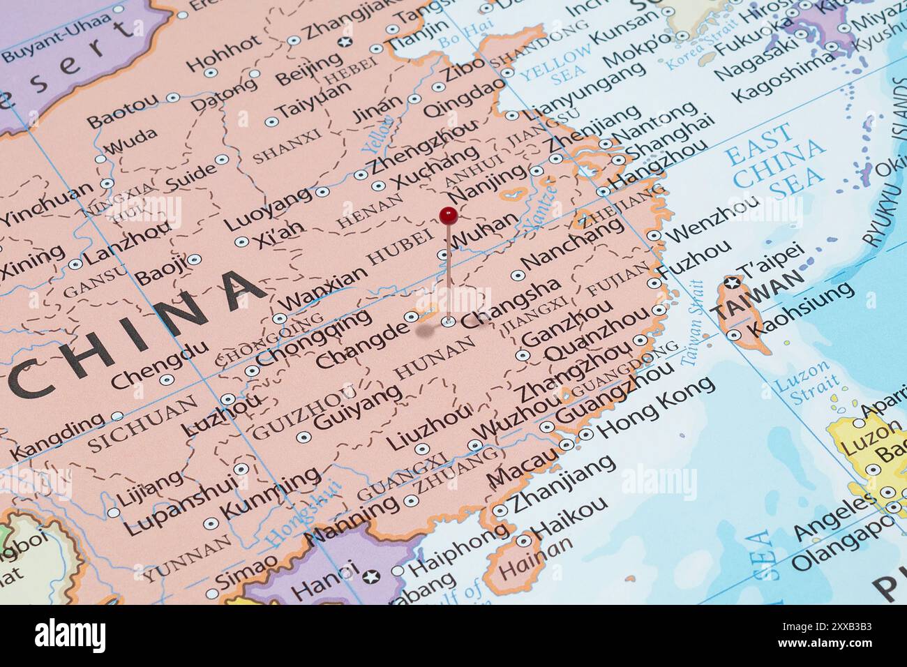 Close up to a Changsha city with a red pin needle into China country ...
