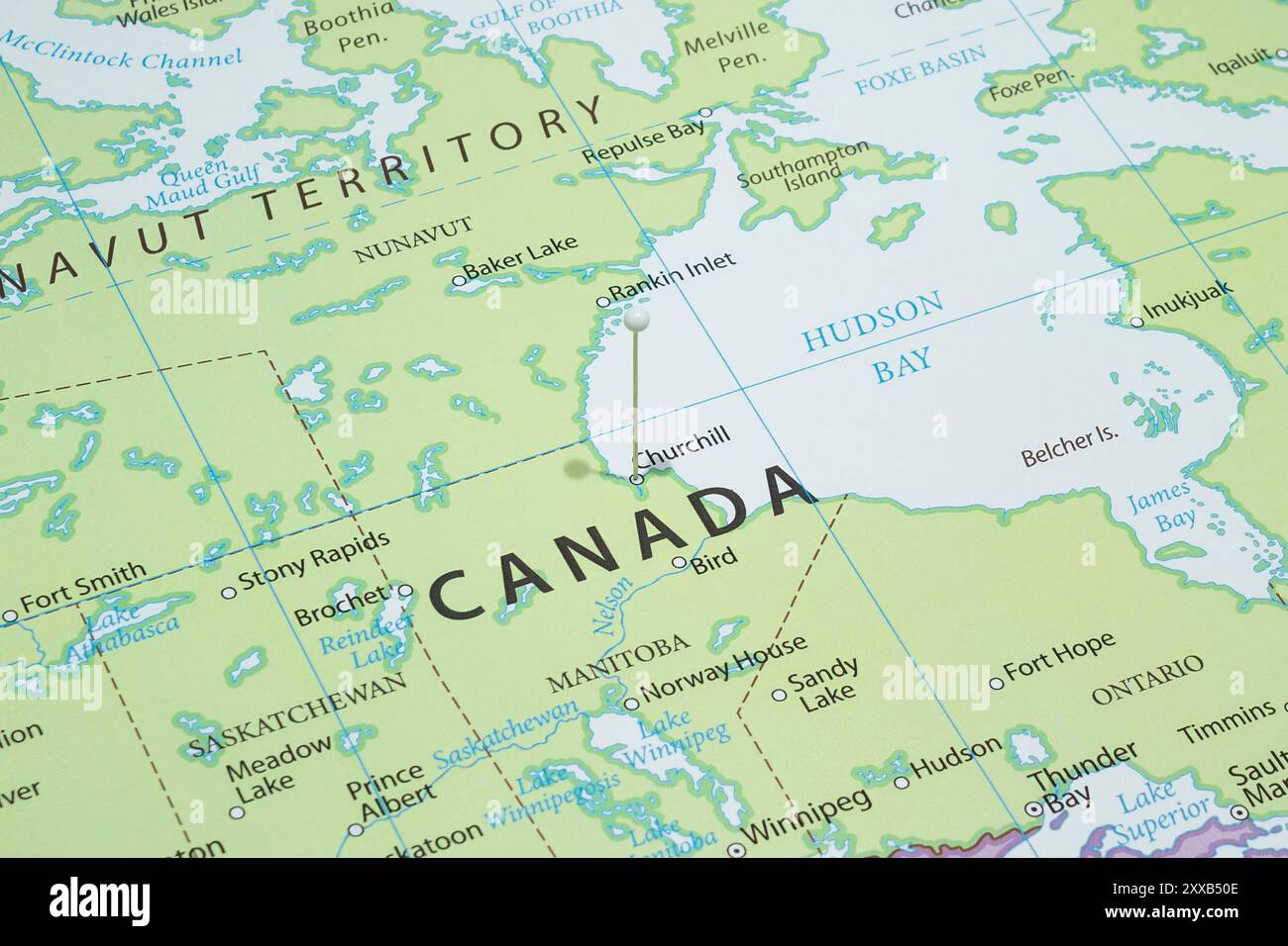 Close up to a Churchill city with a white pin needle into Canada ...