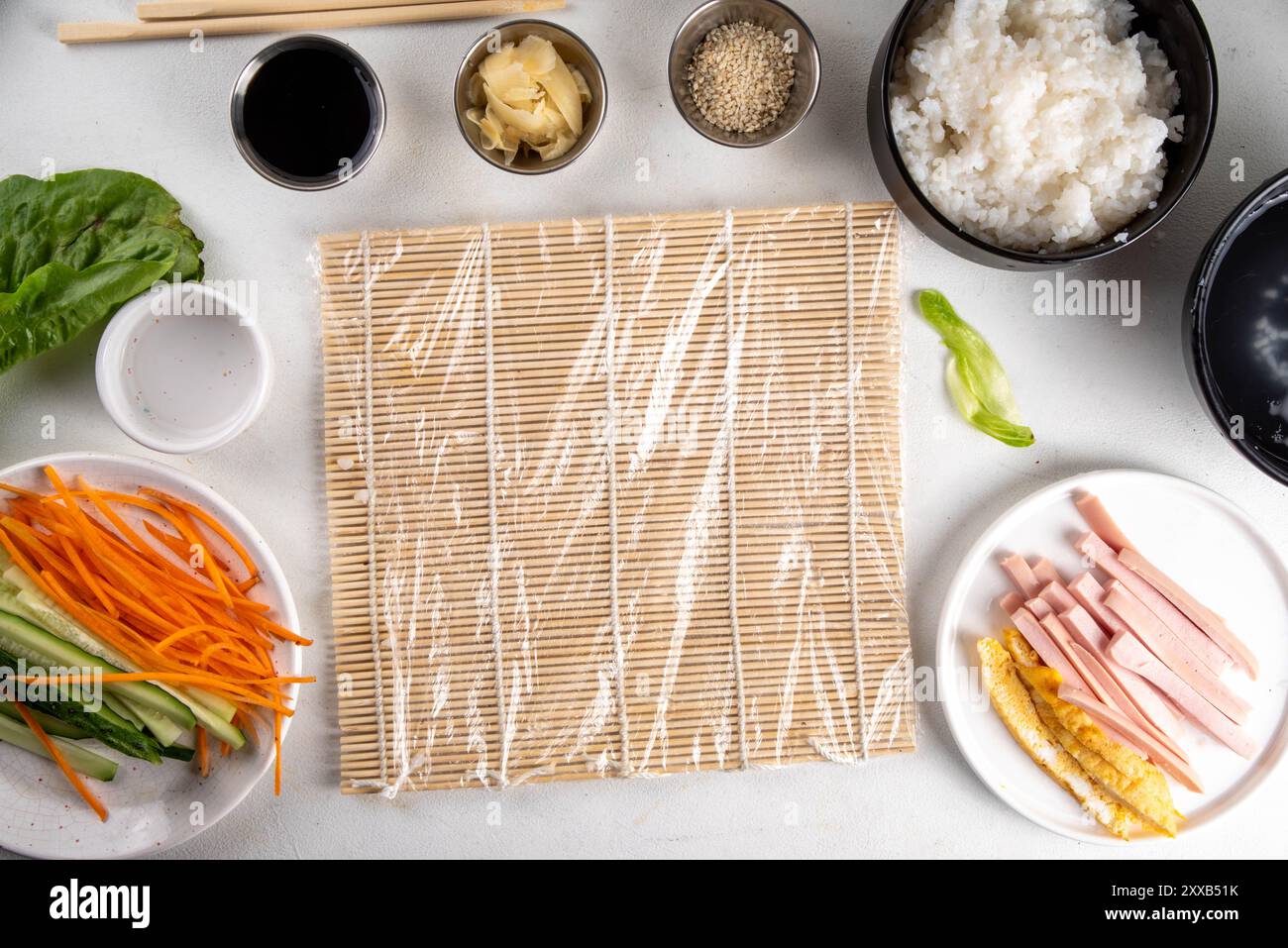 Traditional Korean food kimbap, with ham, vegetables and lettuce ...