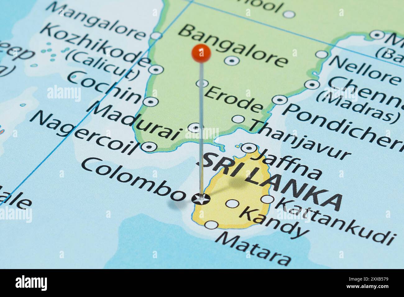 Close up to a Colombo city with an orange pin needle into Sri Lanka ...