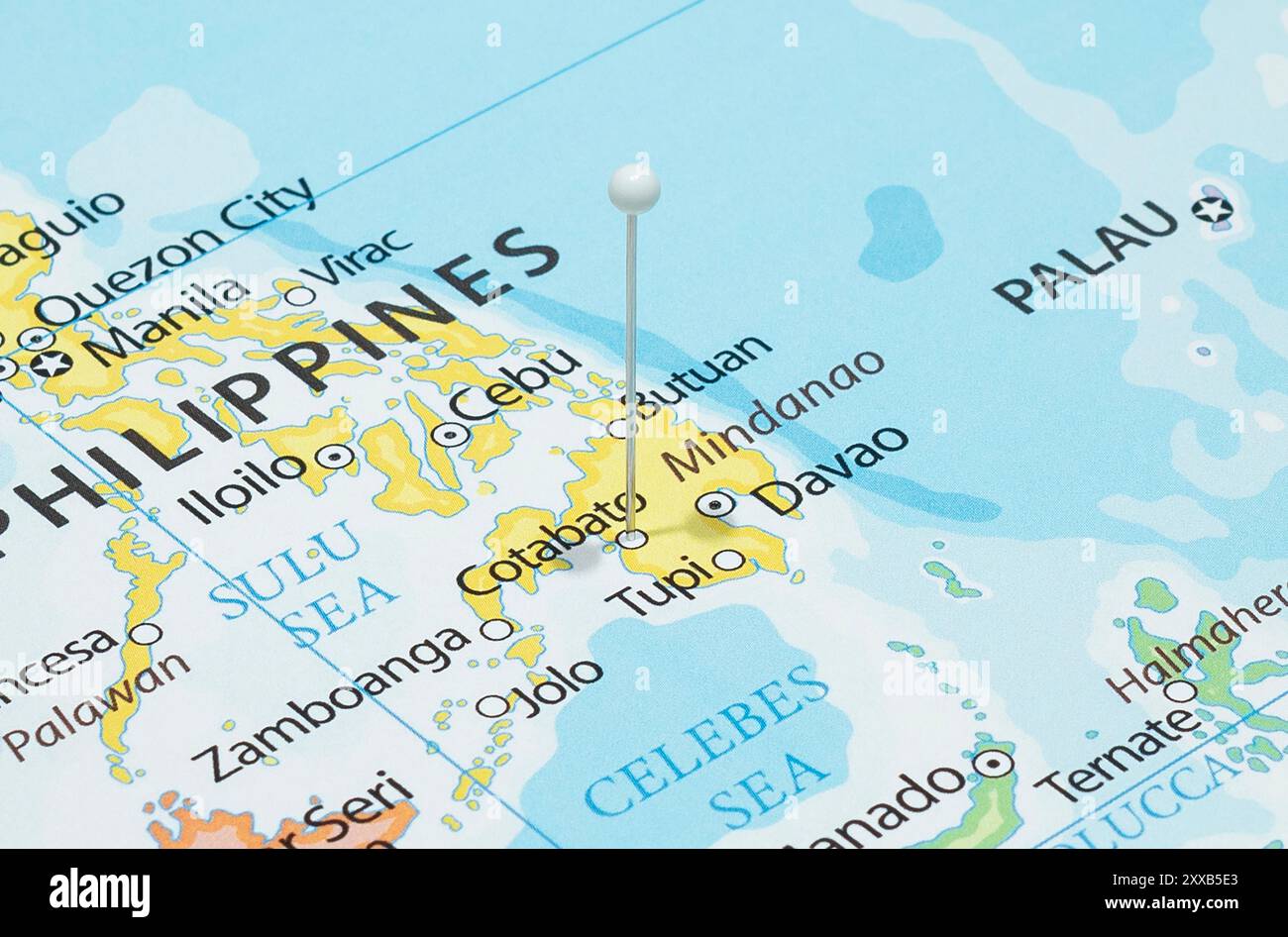 Close up to a Cotabato city with a white pin needle into Philippines ...