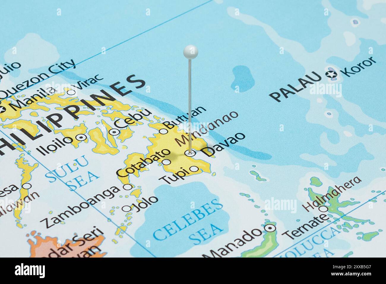 Close up to a Davao city with a white pin needle into Philippines ...