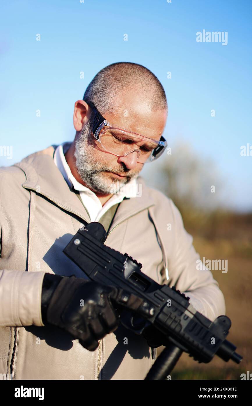 Black rifle hi-res stock photography and images - Alamy