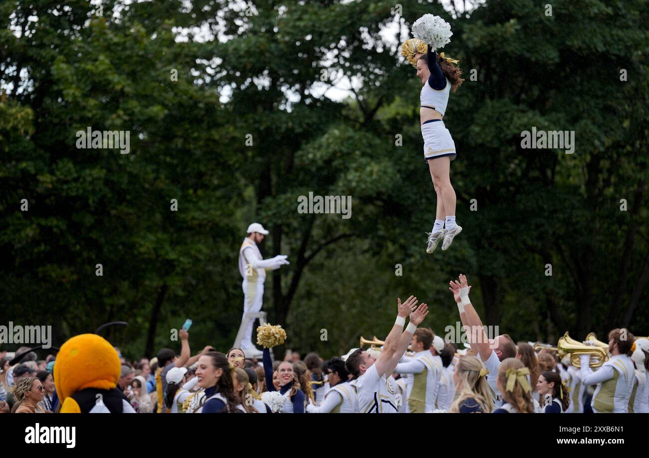 Georgia Tech cheerleaders performing at the Georgia Tech Helluva Block ...