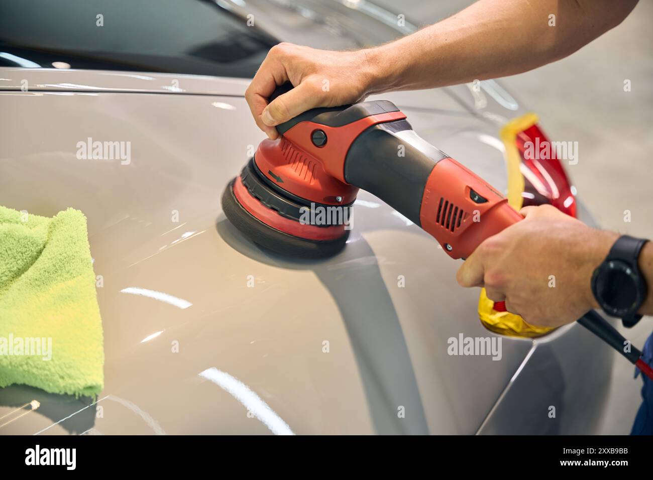 Male employee uses machine hi-res stock photography and images - Alamy