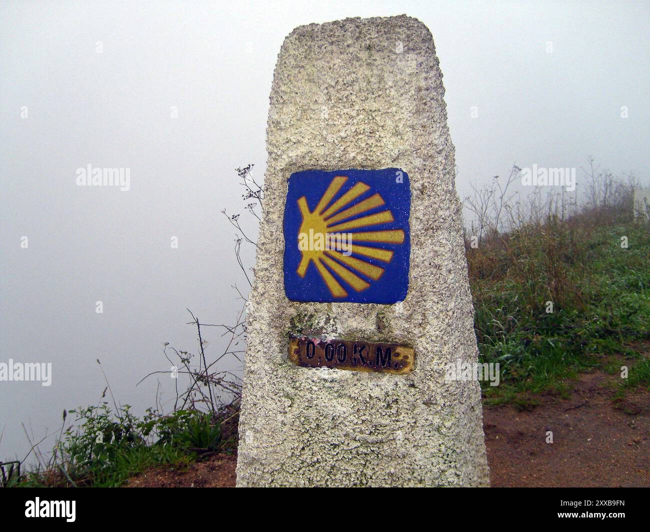 Finisterre, Spain. Milestone with symbol of Spanish Way of St James at ...