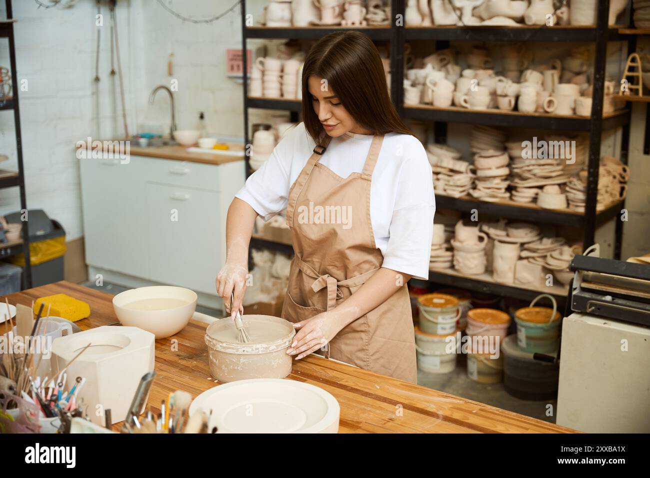 Master ceramist working in her studio Stock Photo - Alamy