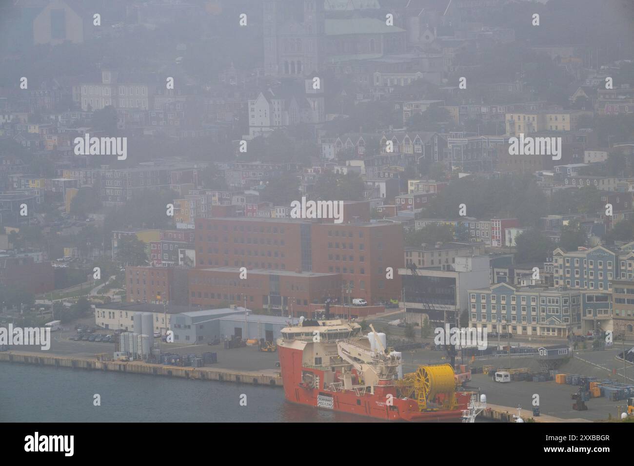 Supply ship in the fog at dock in St. John's harbor, Newfoundland Stock ...