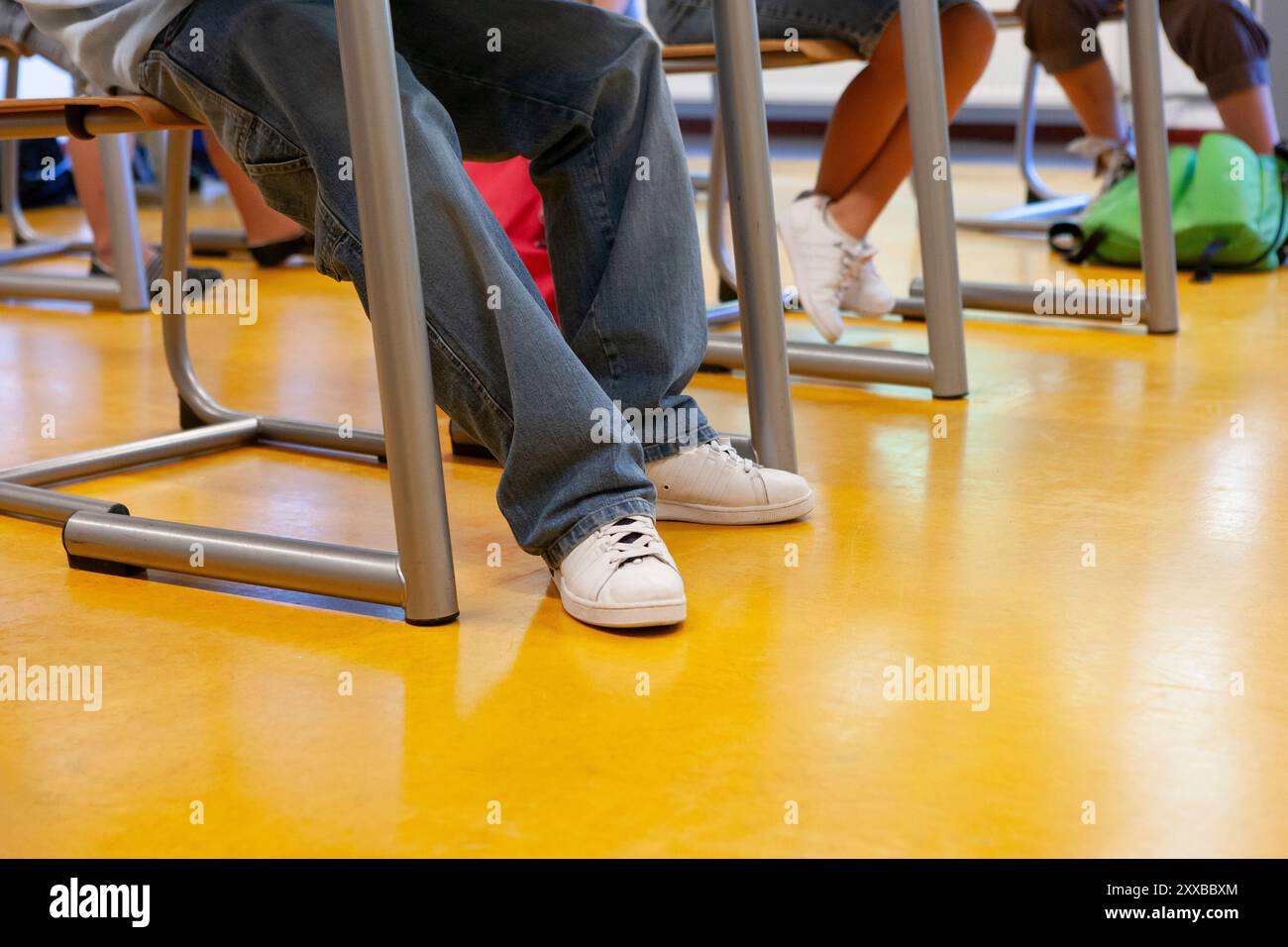 Students legs and feet sitting in the school classroom indoors Stock ...
