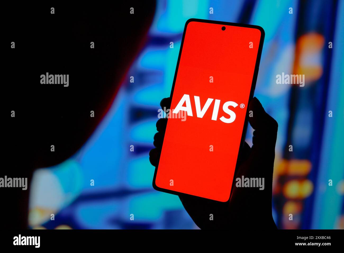 In this photo illustration, the Avis Rent A Car logo is displayed on a ...