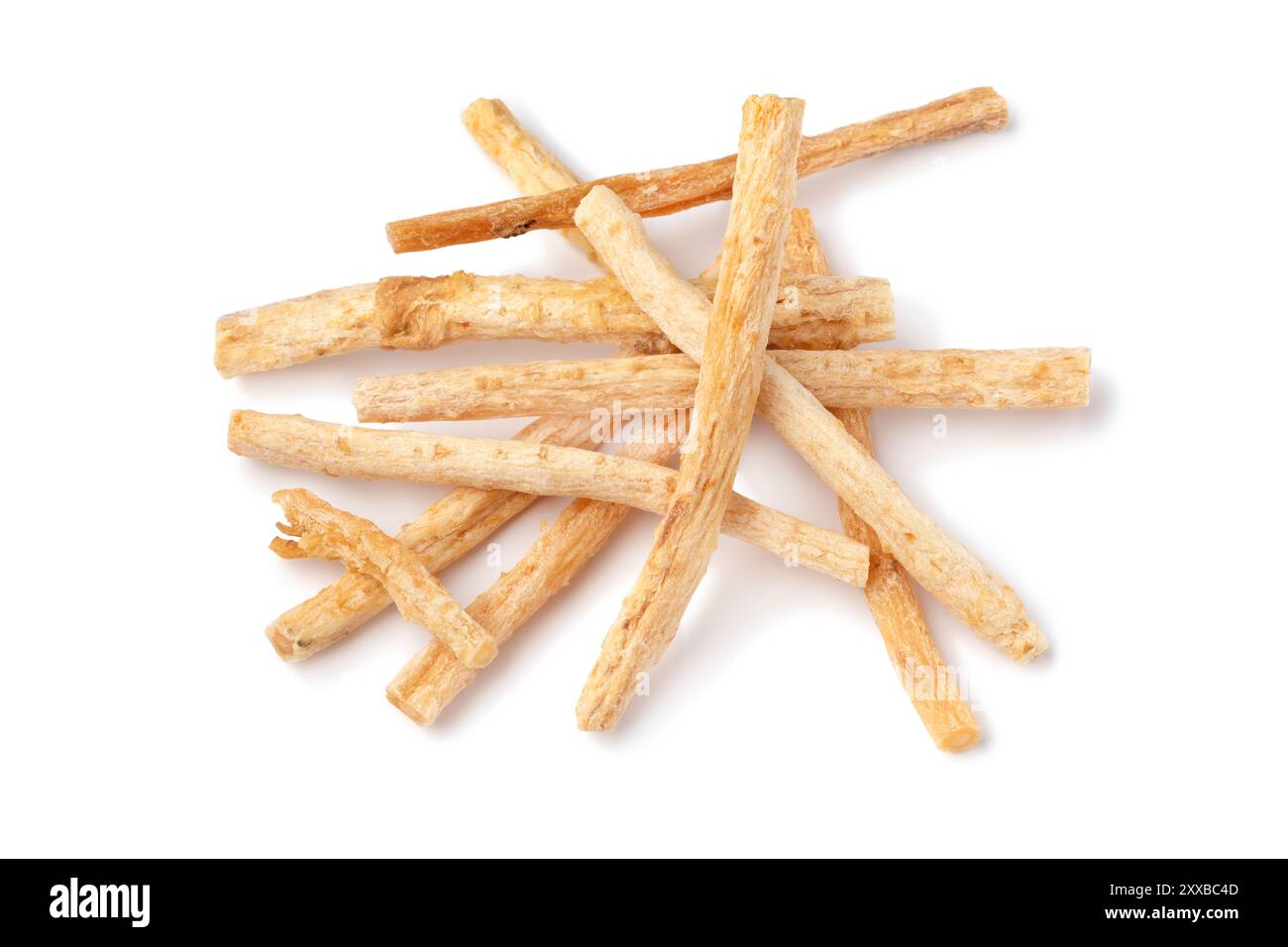 Heap of dried Glehnia roots, sha shen, close up isolated on white background Stock Photo - Alamy
