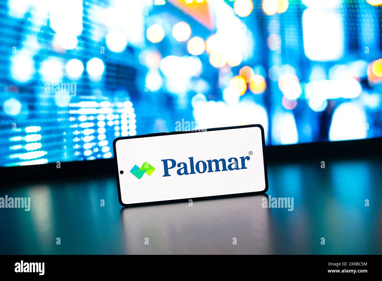 In this photo illustration, the Palomar Holdings, Inc. logo is ...