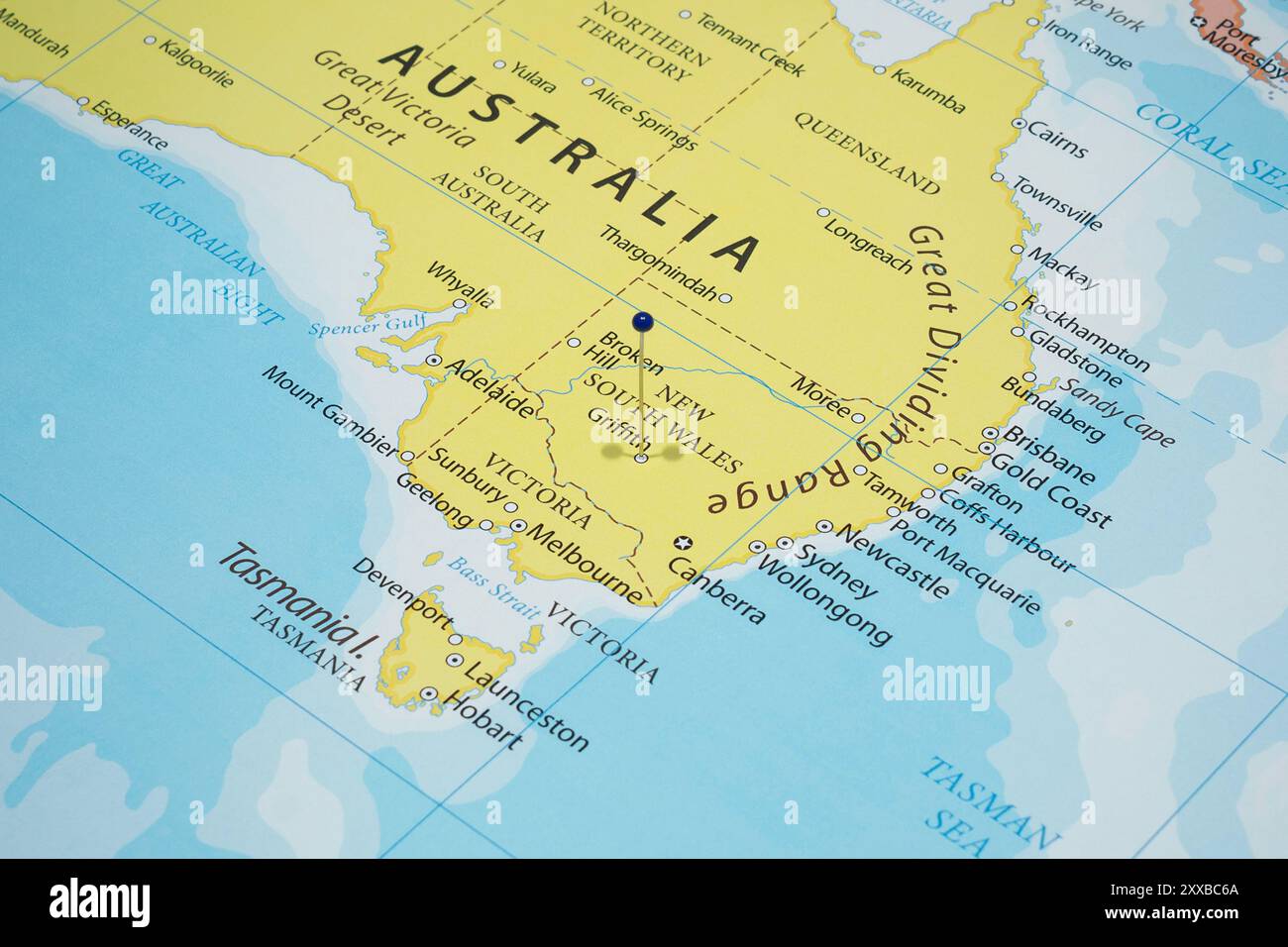 Close up to a Griffith city with a blue pin needle into Australia ...