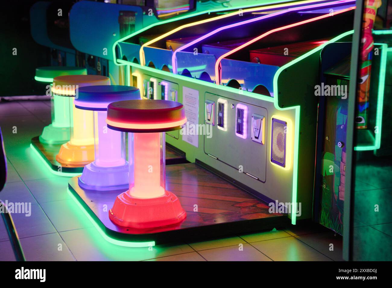 Neon Dream: Flashy Colors Illuminate the Arcade Machine Stock Photo - Alamy