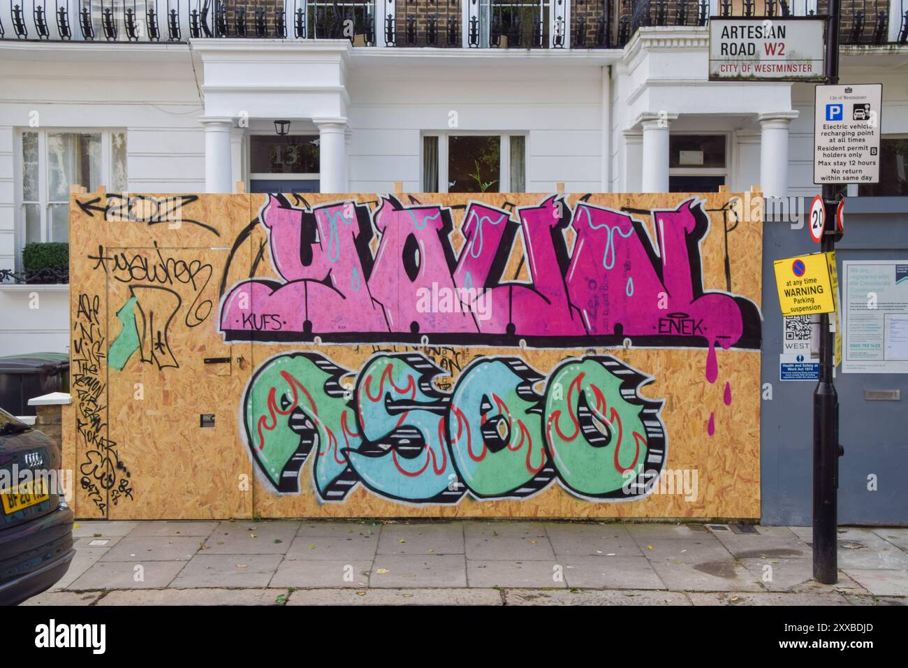 Protective boards have been erected outside residential houses and ...