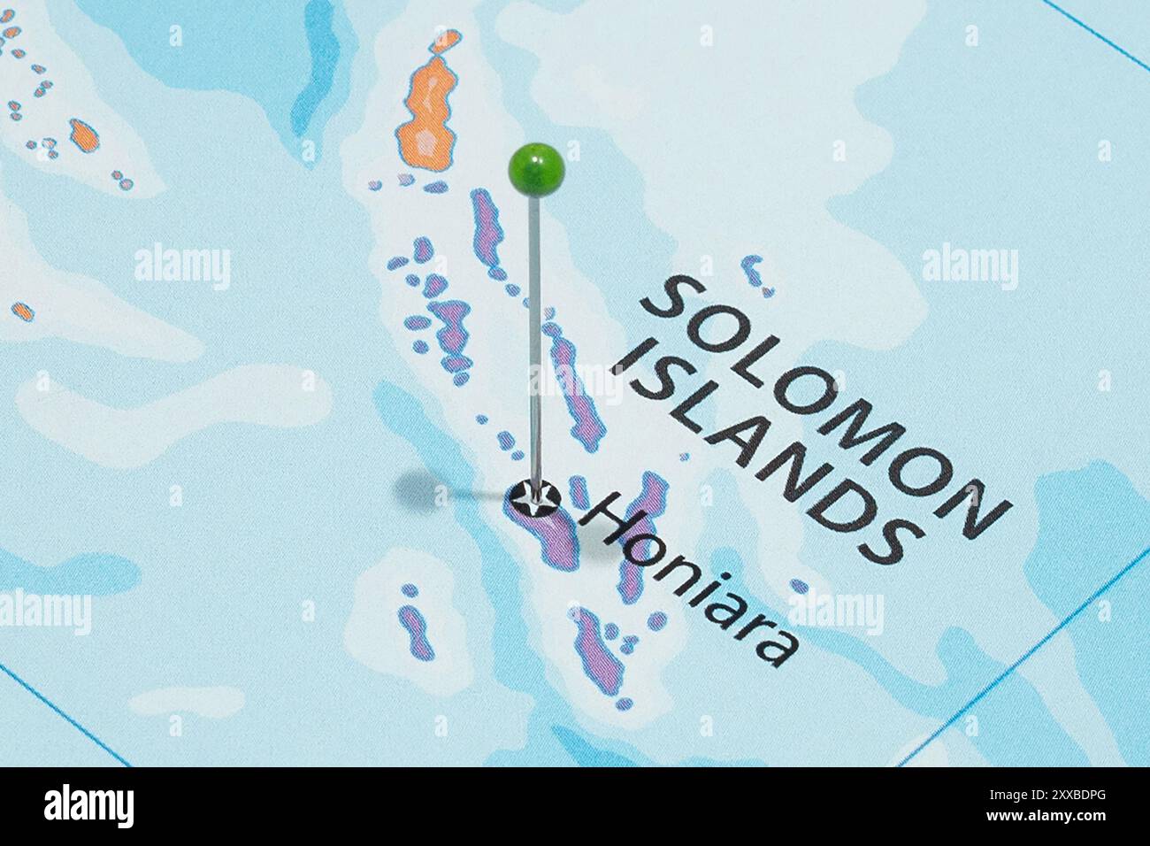 Close up to a Honiara city with a green pin needle into Solomon Islands ...