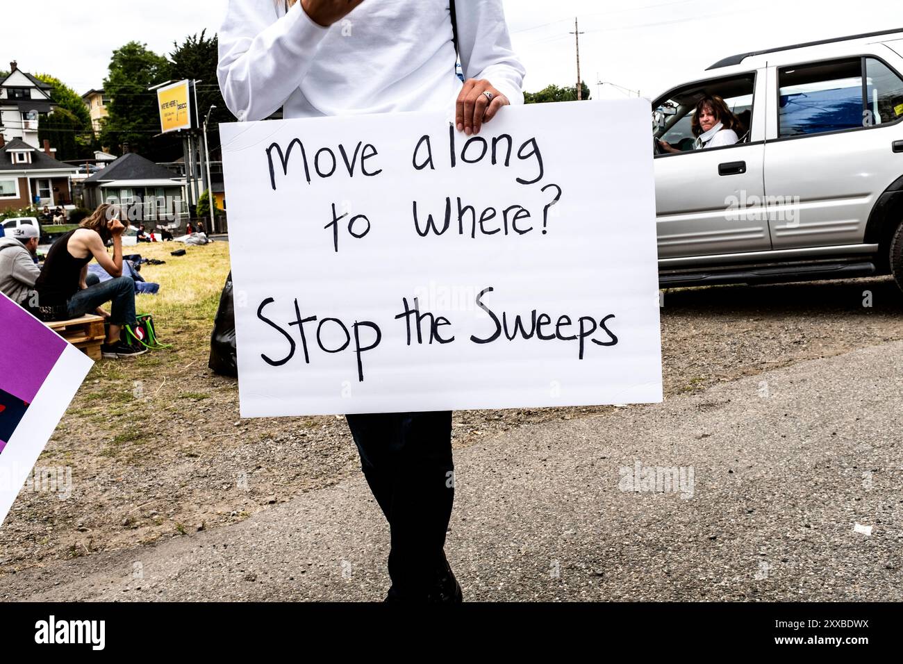 Sign held by a concerned citizen as the homeless camp was disassembled ...
